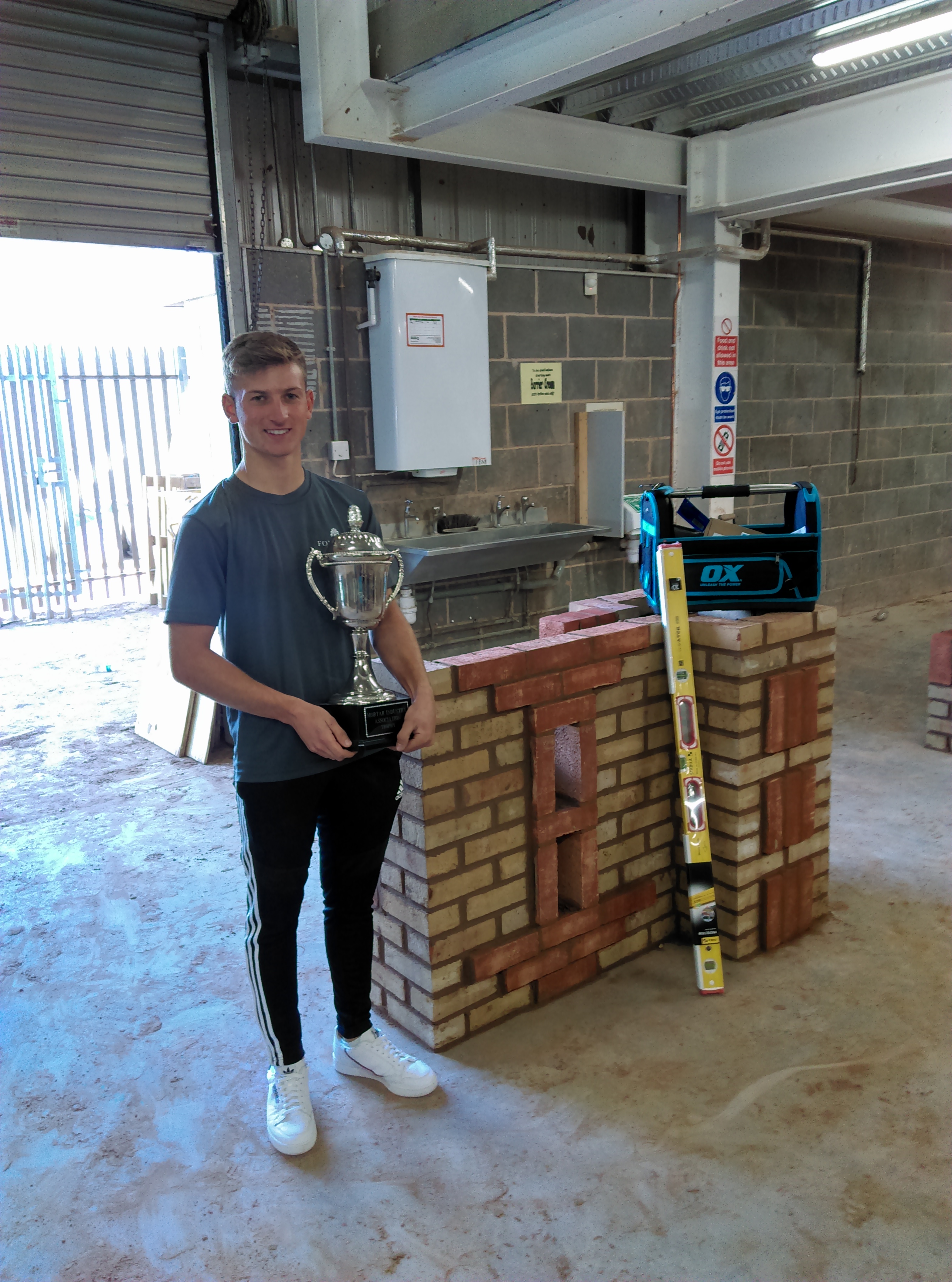 Student clinches first place in national bricklaying competition ...